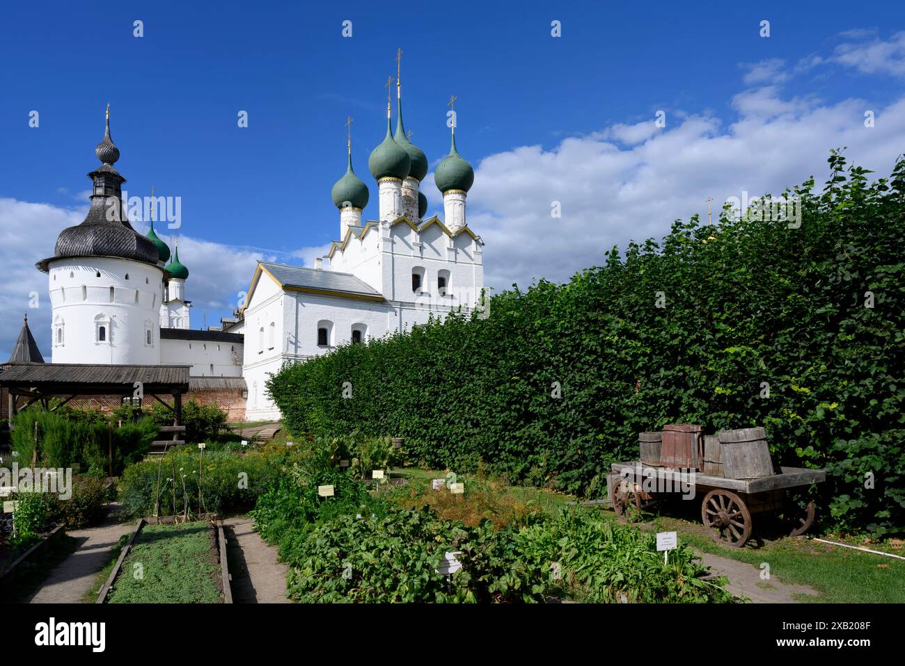 Beds with plant names in the Metropolitan Garden with a Church. St ...