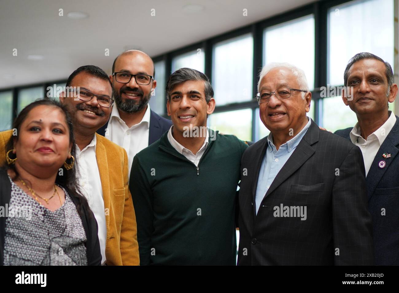 Prime Minister Rishi Sunak poses for a photo with supporters at Squires ...