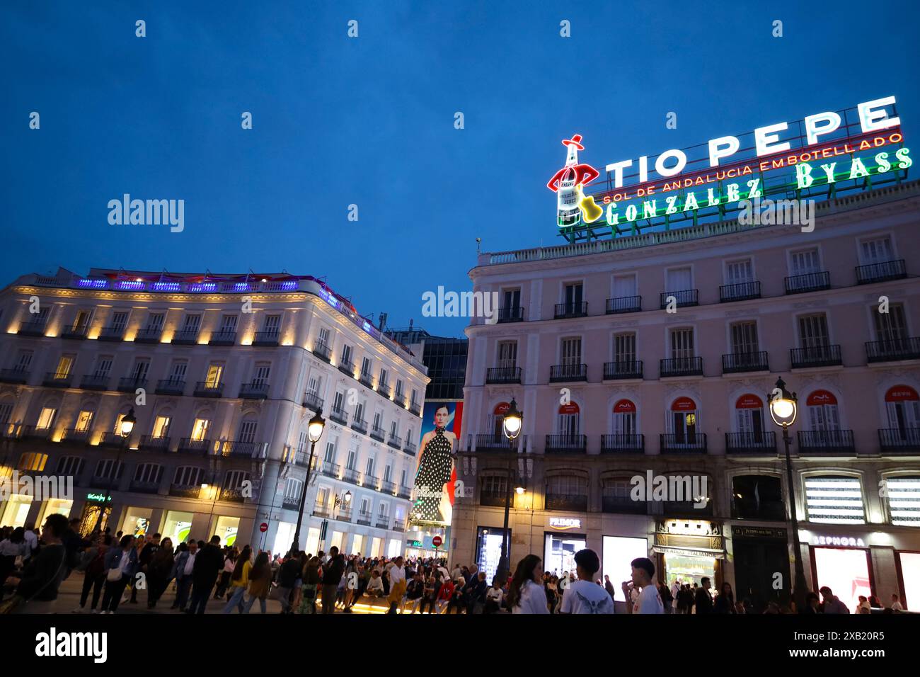 Madrid, Spain- April 8, 2024: Tio Pepe sign at night in Puerta del Sol ...
