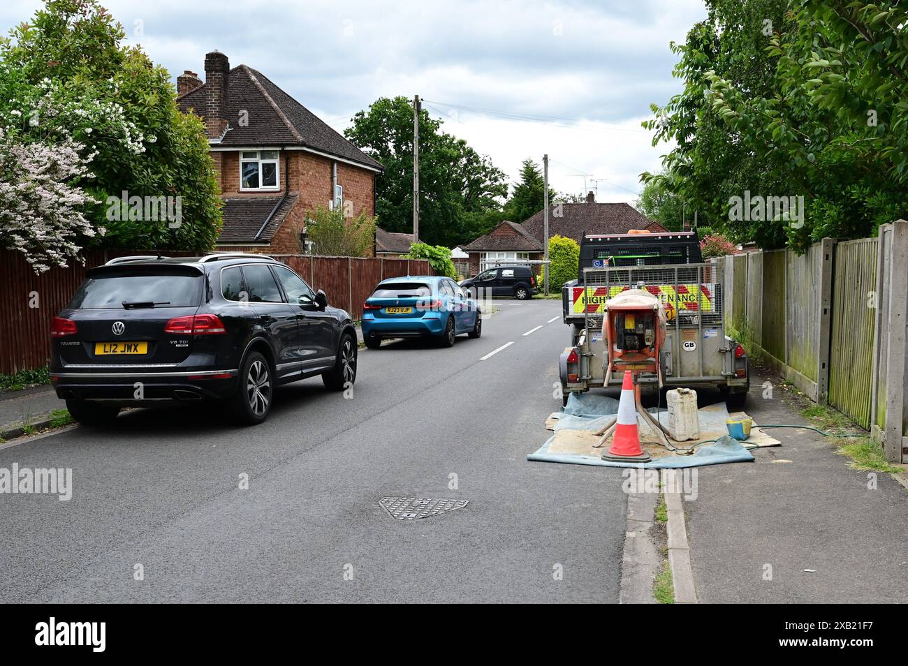 Tradesmans van and trailor illegally parked on the pavement in the UK ...