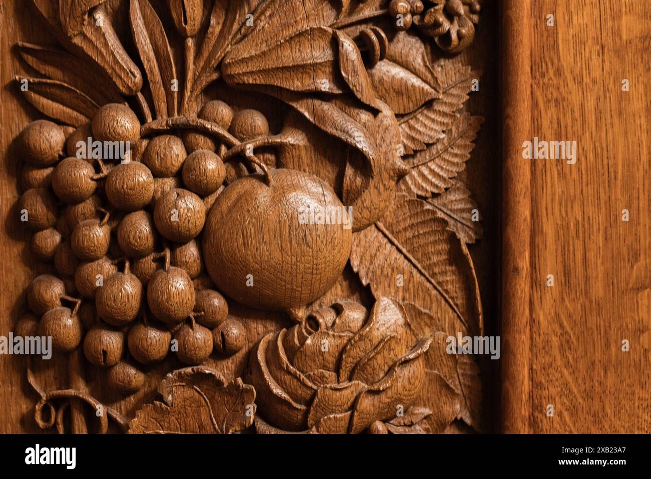 Decorative carving pattern of vintage wooden cabinet panel, close up ...