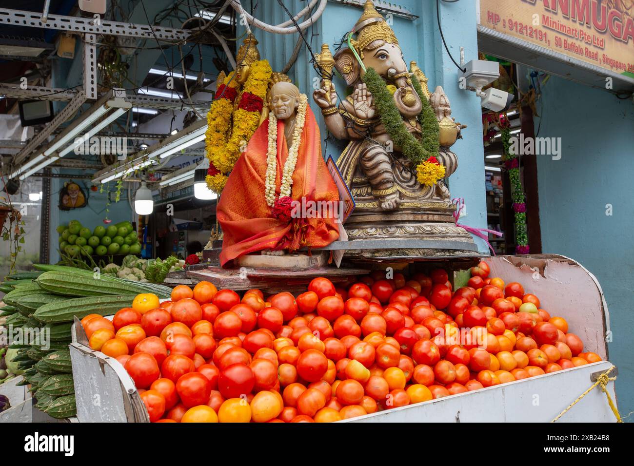 Three gods, deities with garlands placed outside the column at a mini ...