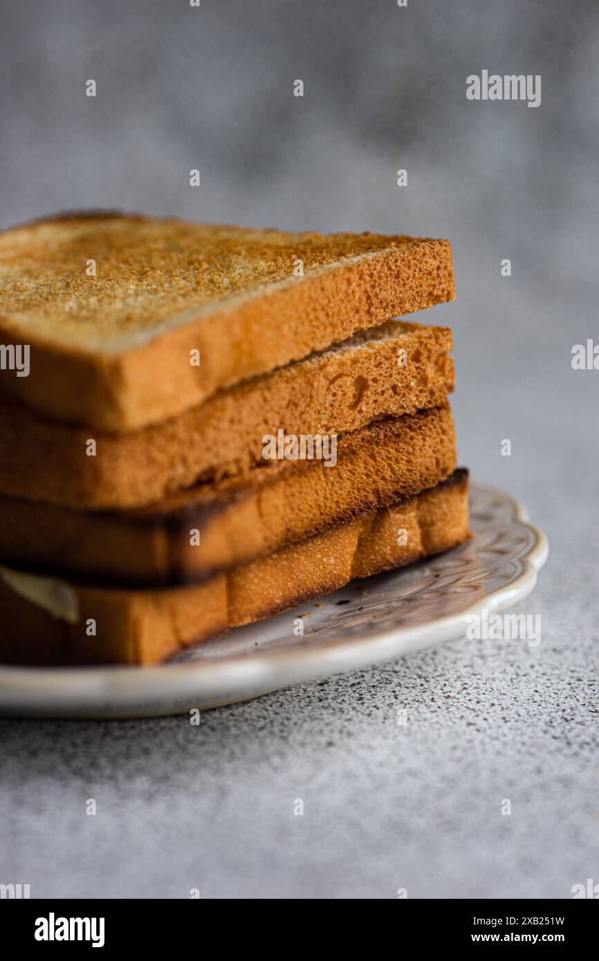 Plate with toast bread in the stack Stock Photo - Alamy