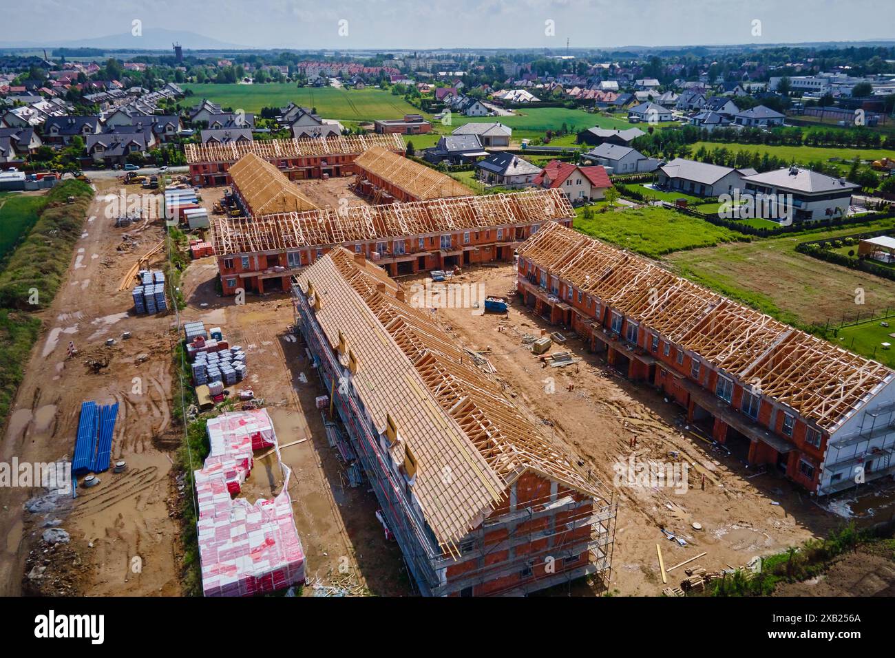 Aerial view of new house construction project in suburban area ...
