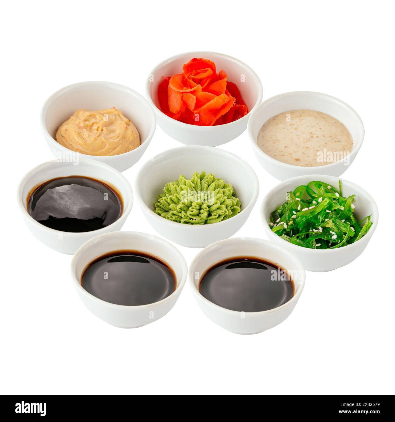 various sauces for sushi rolls on a white background Stock Photo - Alamy