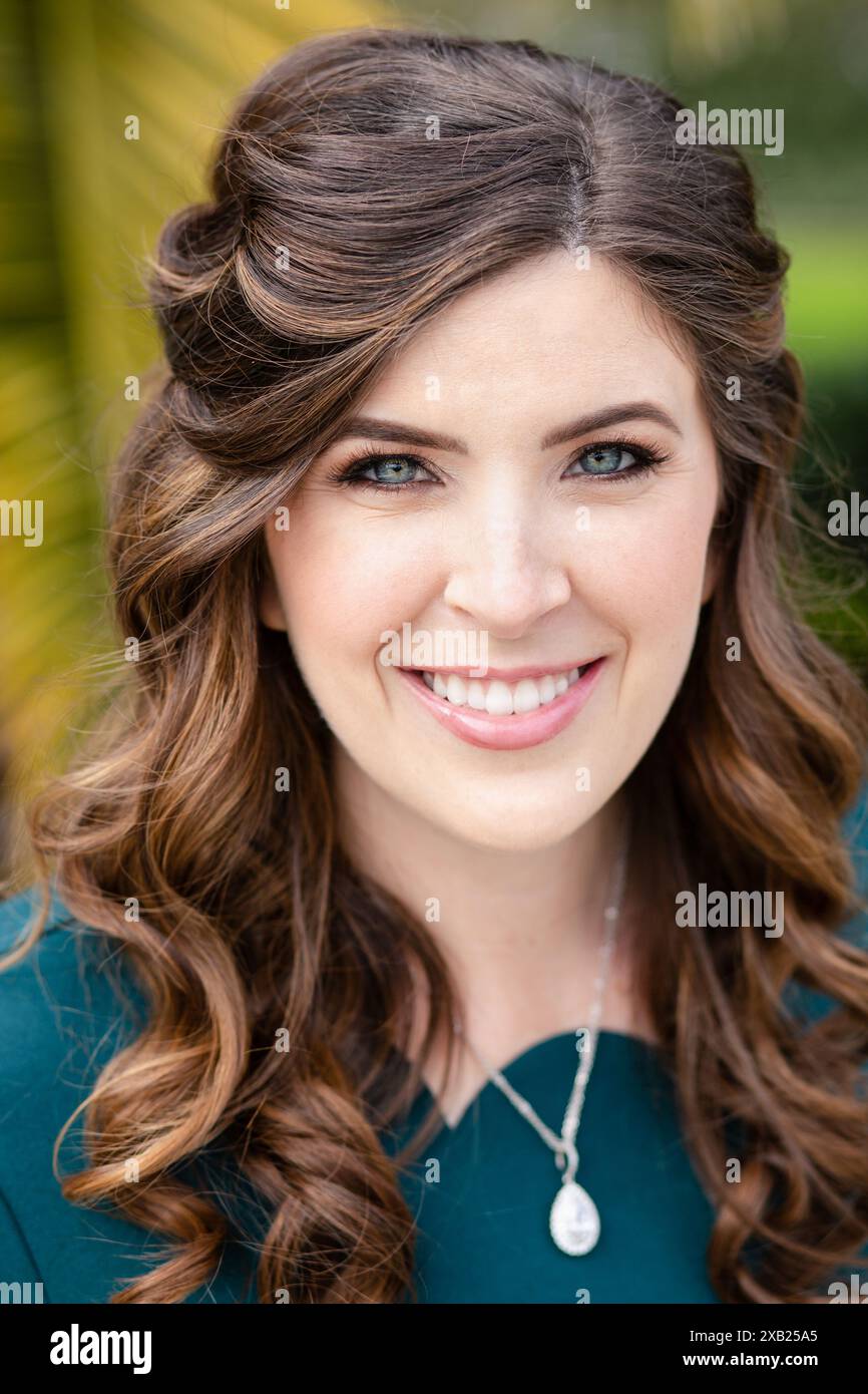 Close up photo of women smiling into the camera with her bright Stock ...