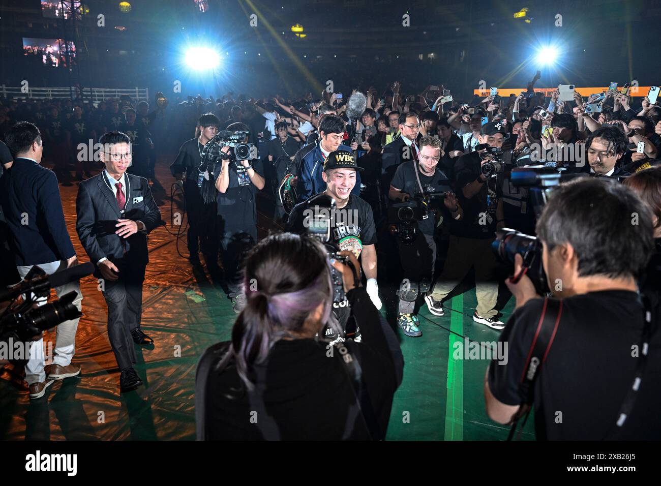 Japan's Naoya Inoue leaves the ring after winning the IBF-WBA-WBC-WBO ...