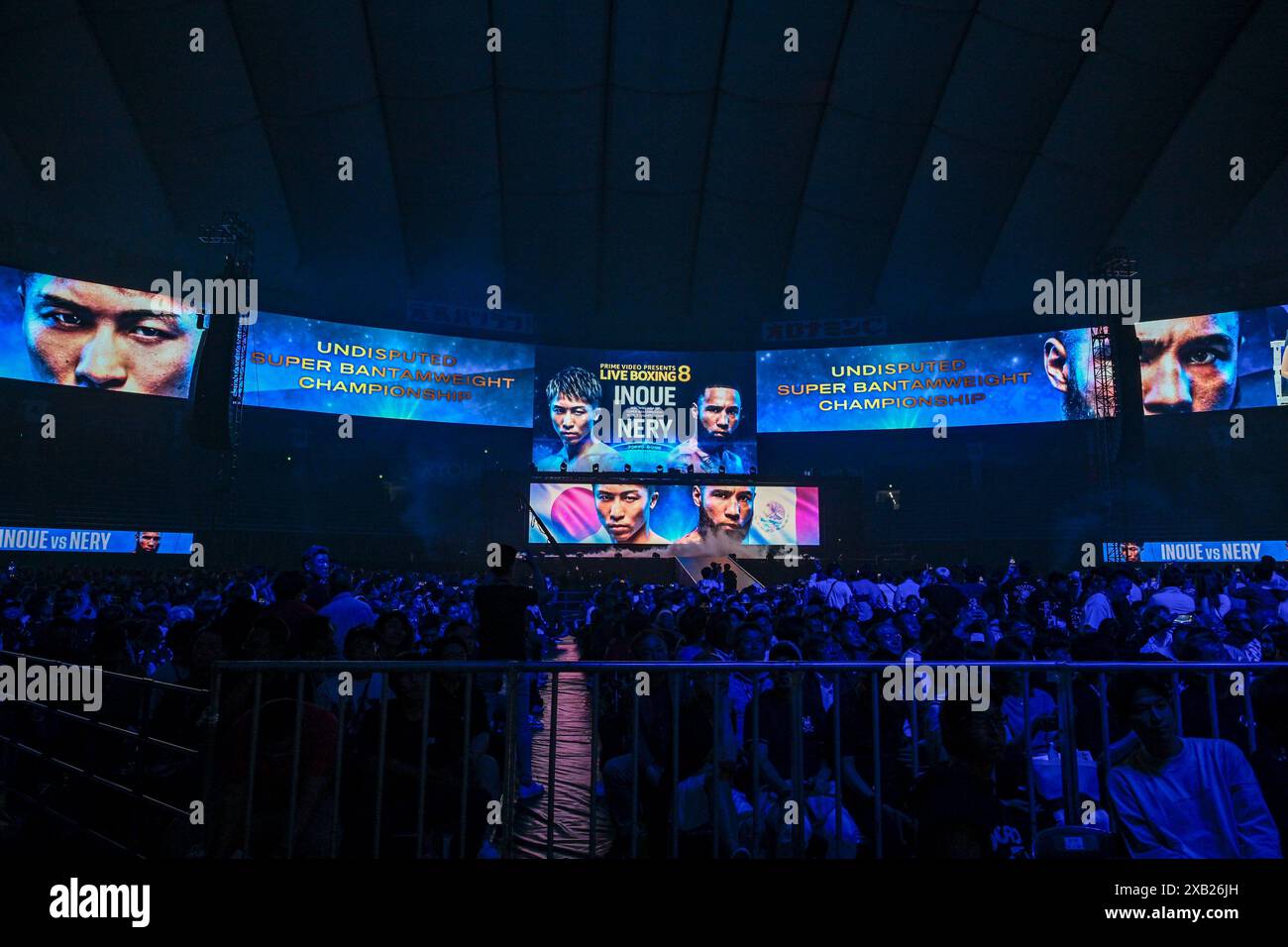 Fans wait as screens show images of Japan's Naoya Inoue and Mexico's ...