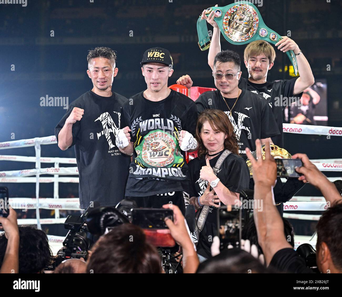 Japan's Naoya Inoue, second left, poses with his brother Takuma Inoue ...