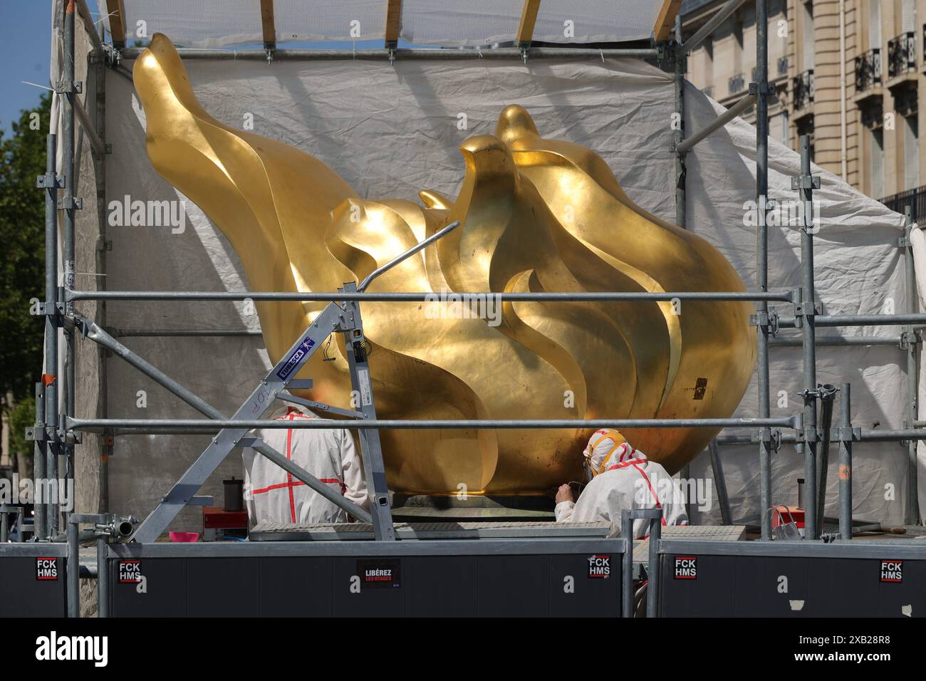 pic shows: Clean up of the Flame of Liberty above the Alma Tunnel where ...