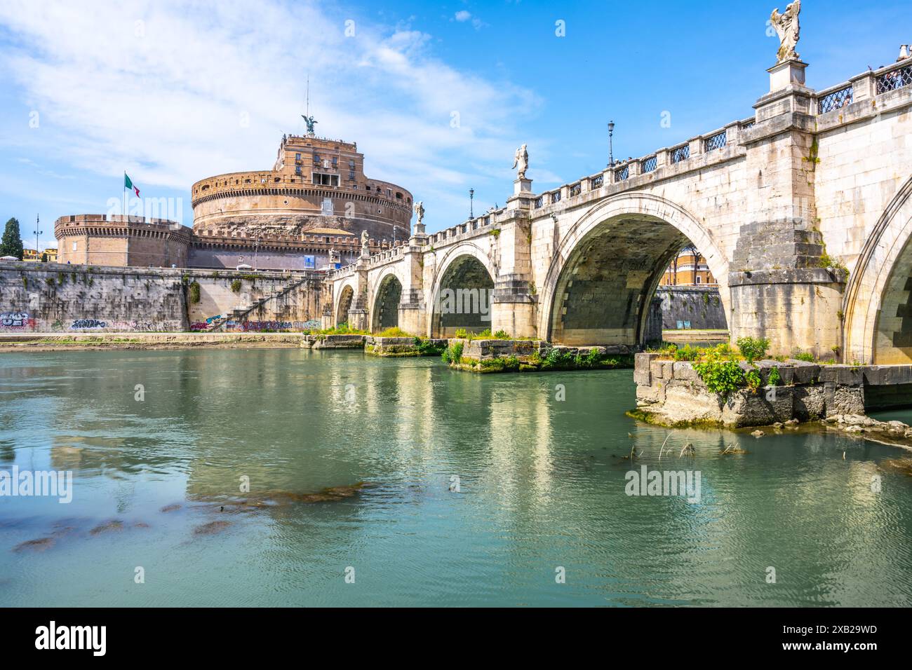 The iconic SantAngelo Bridge and Castel in Rome are reflected on a ...