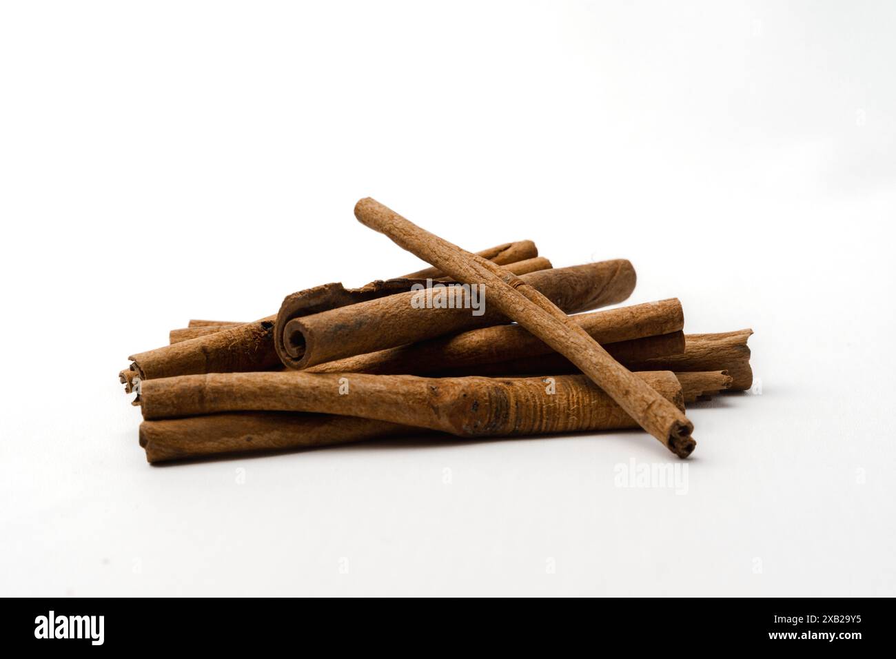 stack of cinnamon stick with a detail texture isolated on a white ...