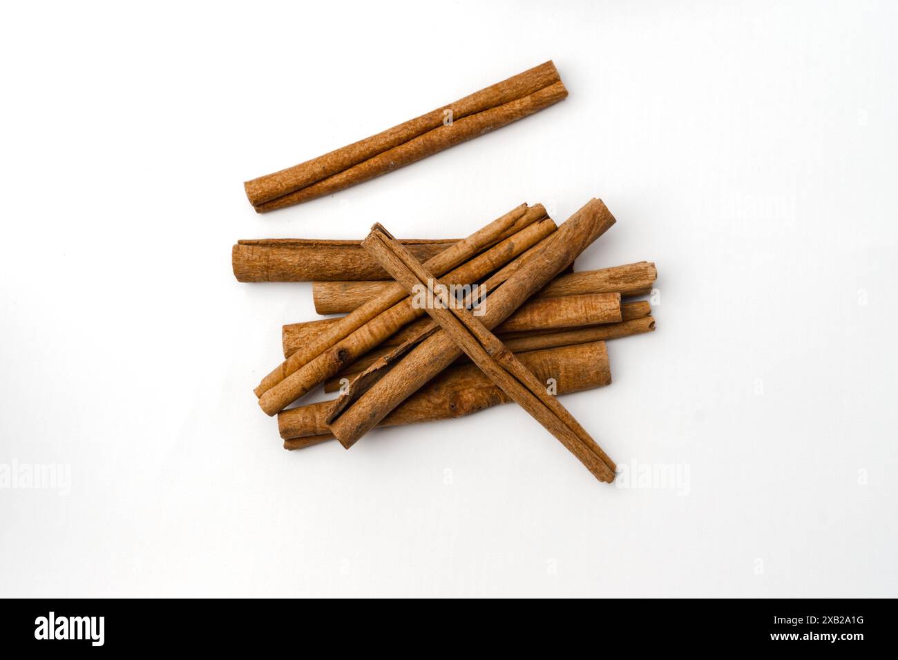 stack of cinnamon stick with a detail texture isolated on a white ...