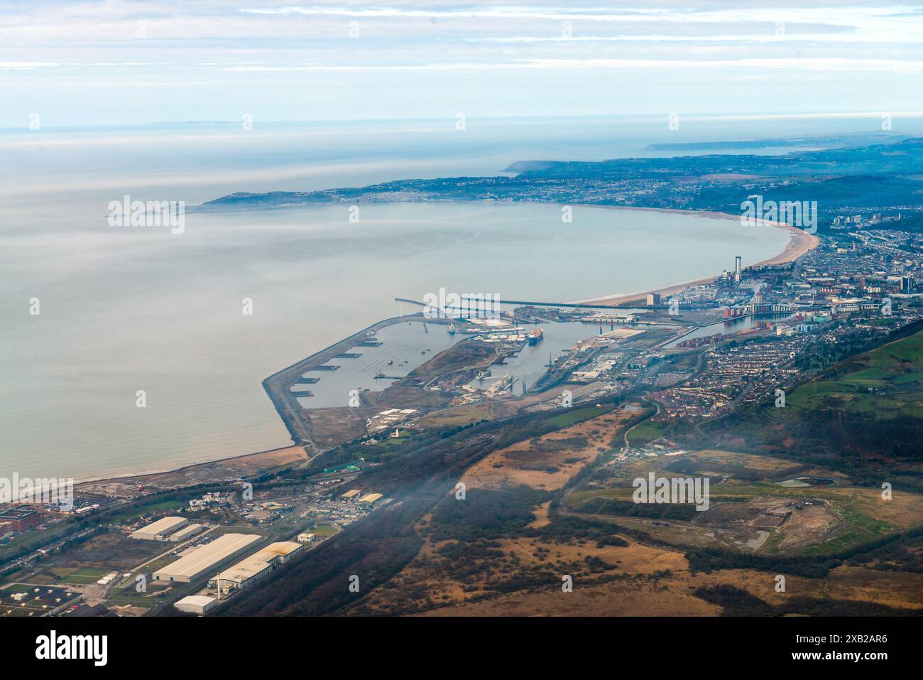 Aerial photography over South Wales. Swansea docks, city centre, Bay ...