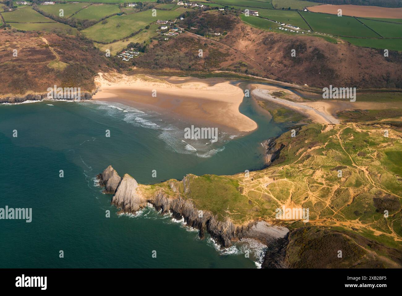 Aerial photography over South Wales. The Gower coast, Three Cliffs Bay ...