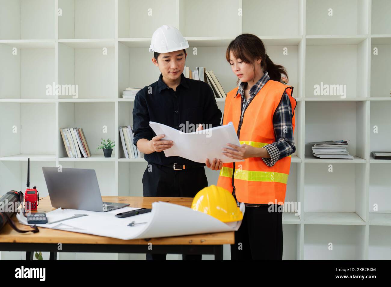 Engineers collaboration on Construction Project in Modern Office with ...