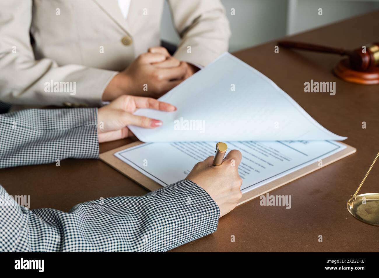 Legal Document Signing in Office of Lawyer and Client Reviewing and ...