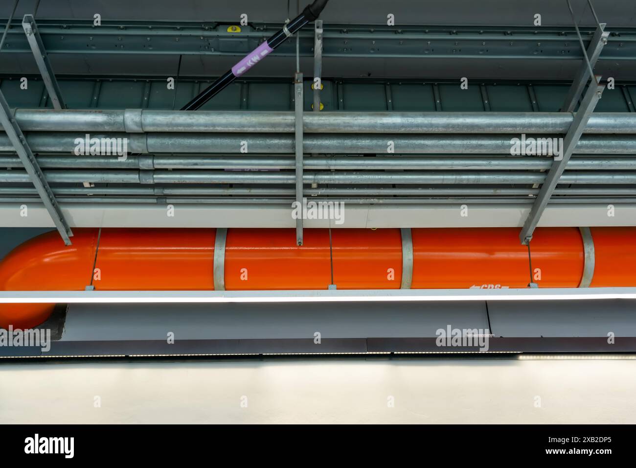 Ceiling with water supply and drainage communication pipes under the ...