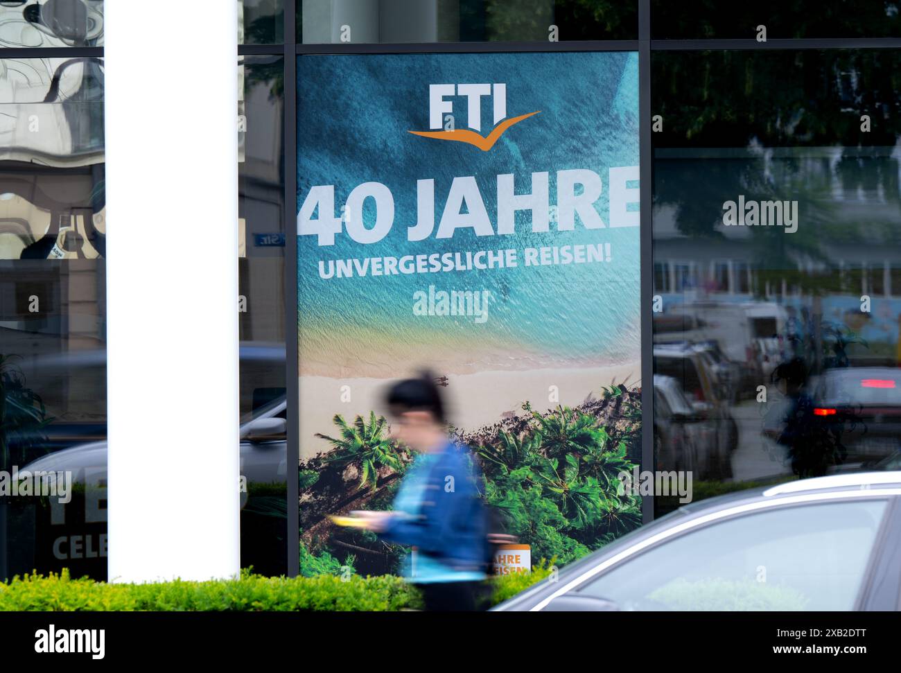 Munich, Germany. 10th June, 2024. A poster of the tour operator FTI (FTI Group) with the ...