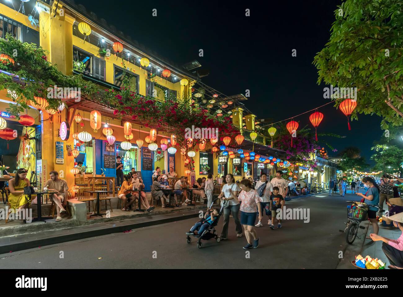 Night view of busy street in Old Town Hoi An. Hoi An is the World's ...