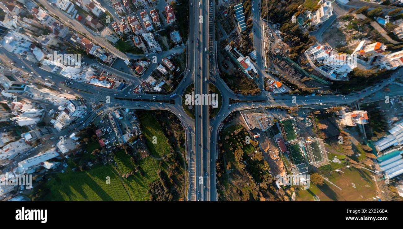 Overhead shot of a complex road junction in an urban area as the city ...