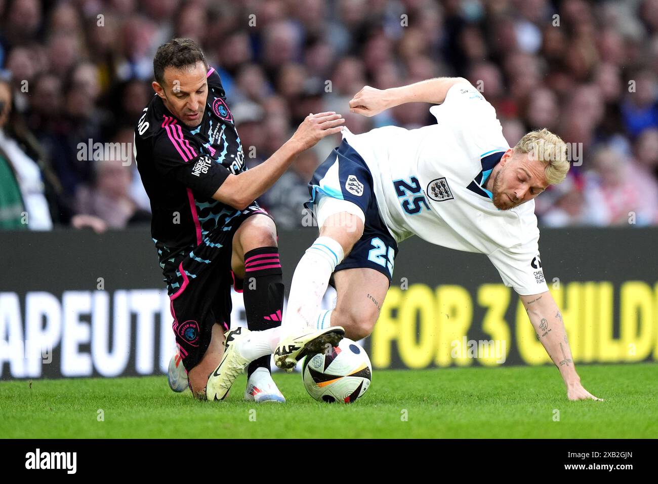 World XI's Alessandro Del Piero (left) and England's Sam Thompson ...