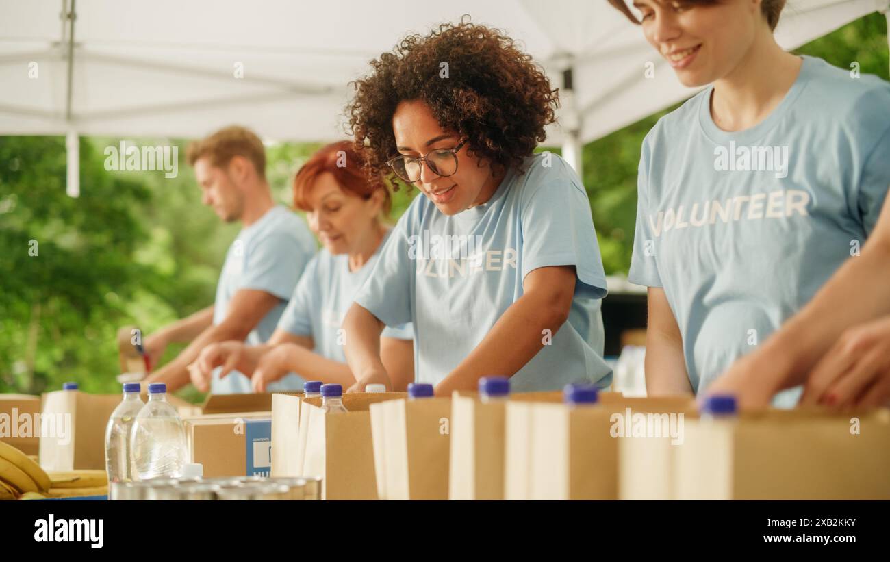 Portrait of a Happy Female Volunteer Preparing Free Food Delivery for ...