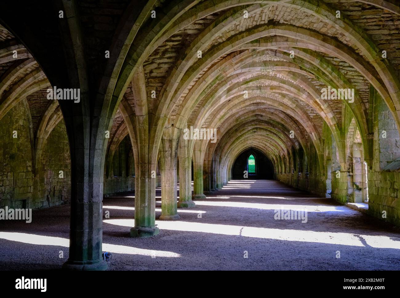 The Cellarium and its beautiful arches of Fountains Abbey, new Ripon in ...