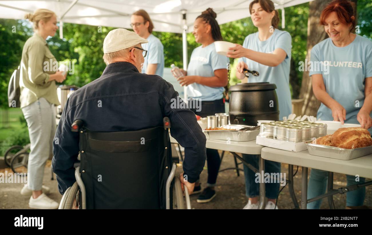 Positive and Smiling Middle Aged Man with Disabilities in a Wheelchair ...