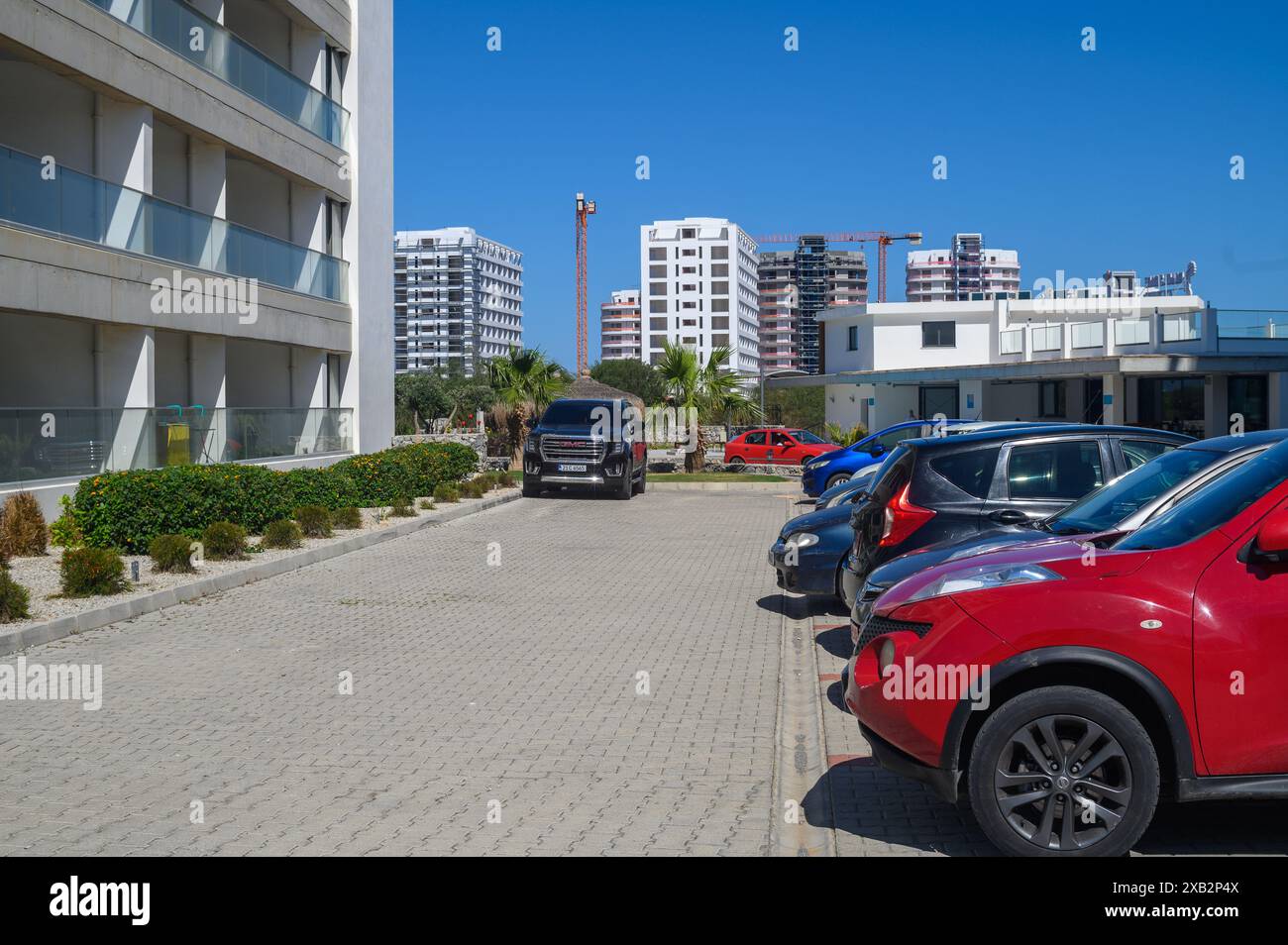 Gaziveren Cyprus 05.27.2024 - cars in the parking lot in a residential ...