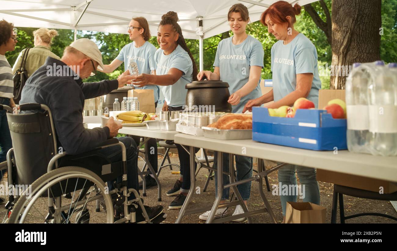 Happy Middle Aged Man with Disabilities Using Wheelchair Receiving a ...