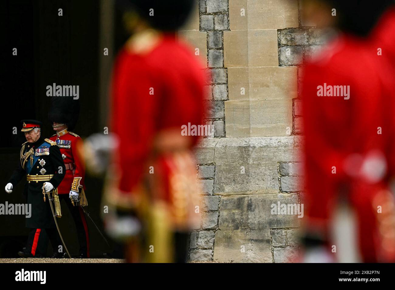 King Charles III, Colonel-in-Chief of the Household Division, presents ...