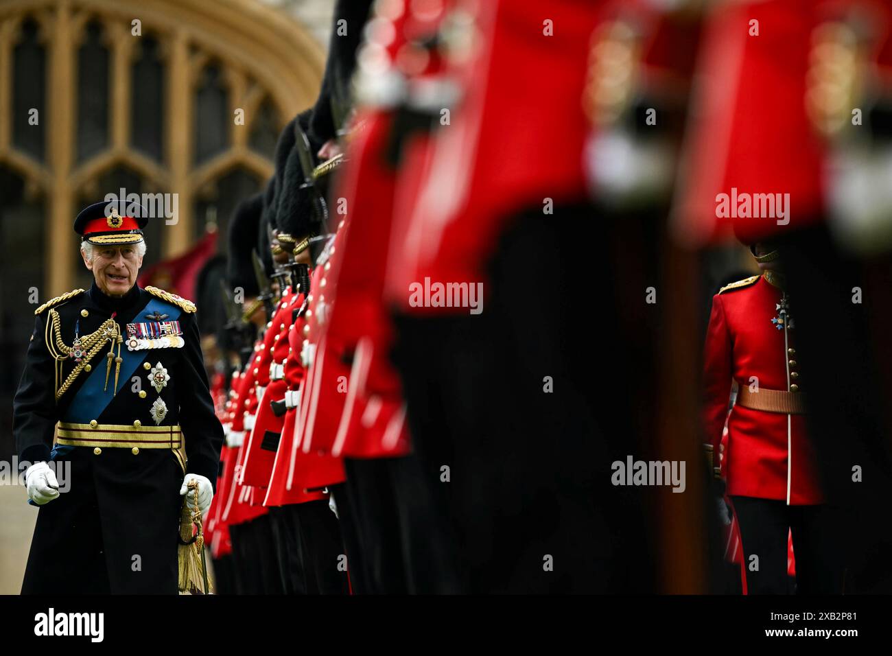 King Charles III, Colonel-in-Chief of the Household Division, presents ...