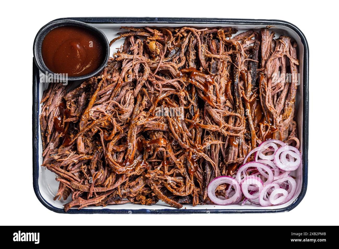 Pulled beef meat with hot chili sauce in baking dish. Isolated on white ...