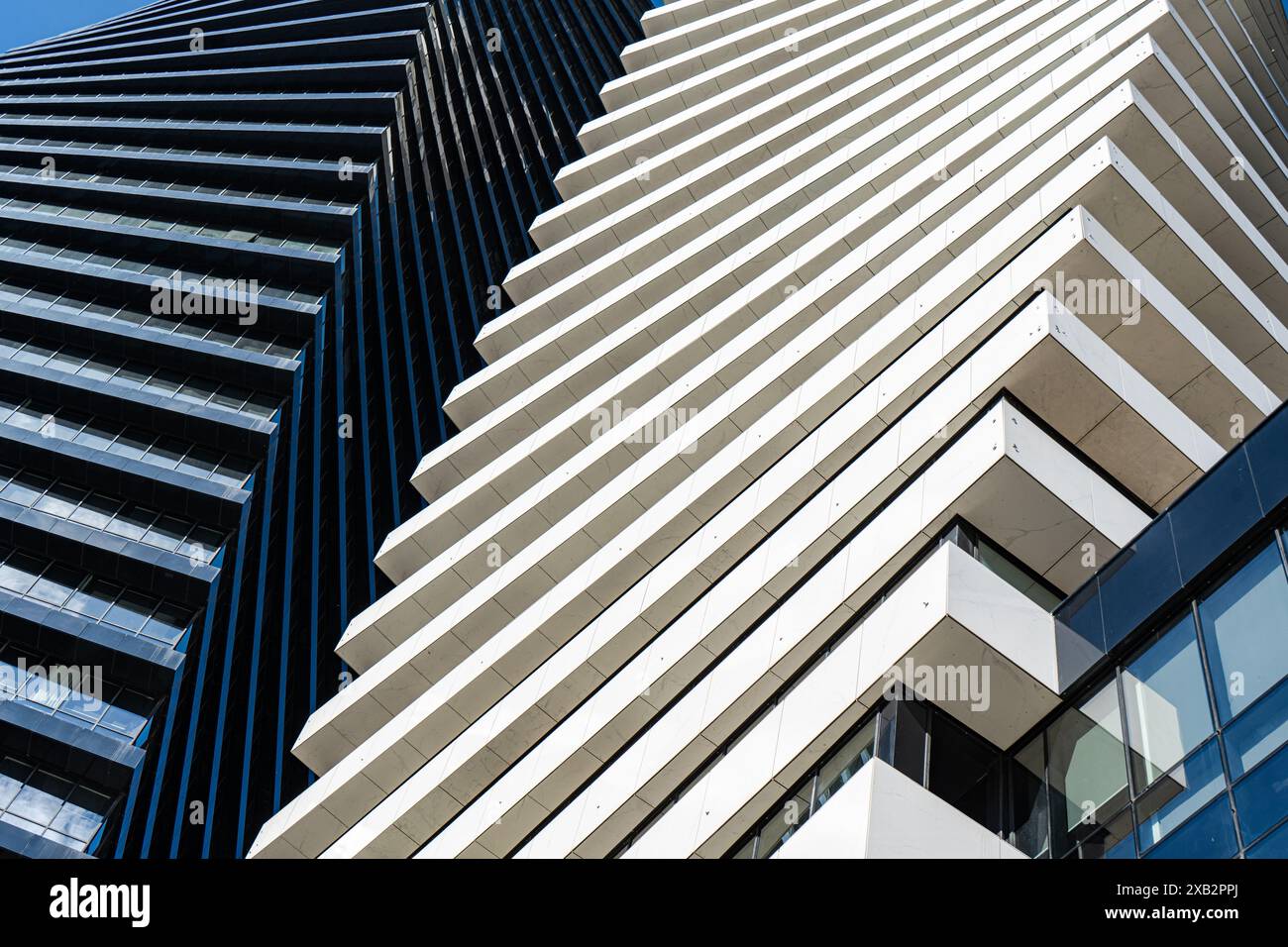 This image captures the intriguing facade of modern spiral buildings in ...