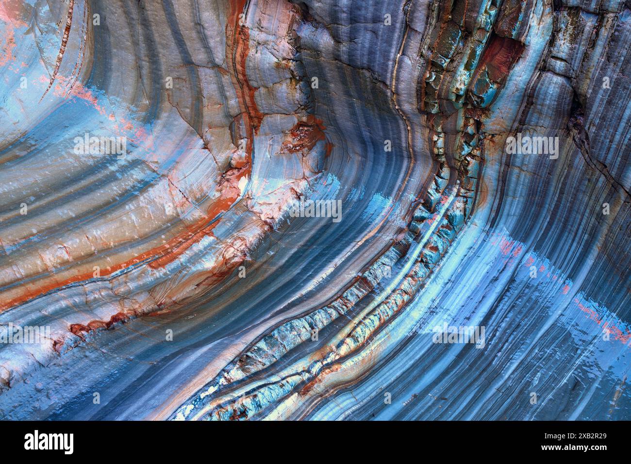 Vivid layers of stratified and laminated slate and quartzite rocks ...