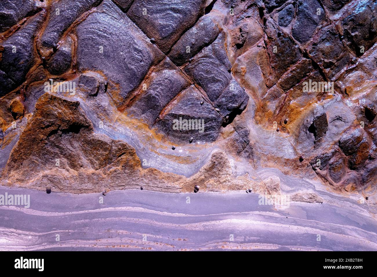 Abstract textures and patterns in multi-colored rock surfaces, ideal ...