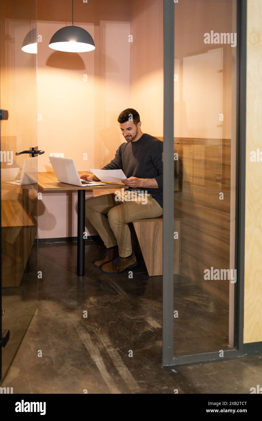 Office worker man reviews document hi-res stock photography and images ...