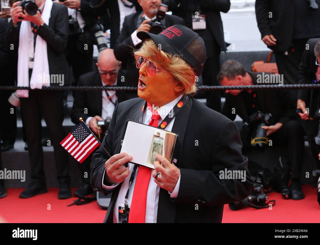 Cannes, France, 20th May, 2024. A Donald Trump impersonator on the red ...