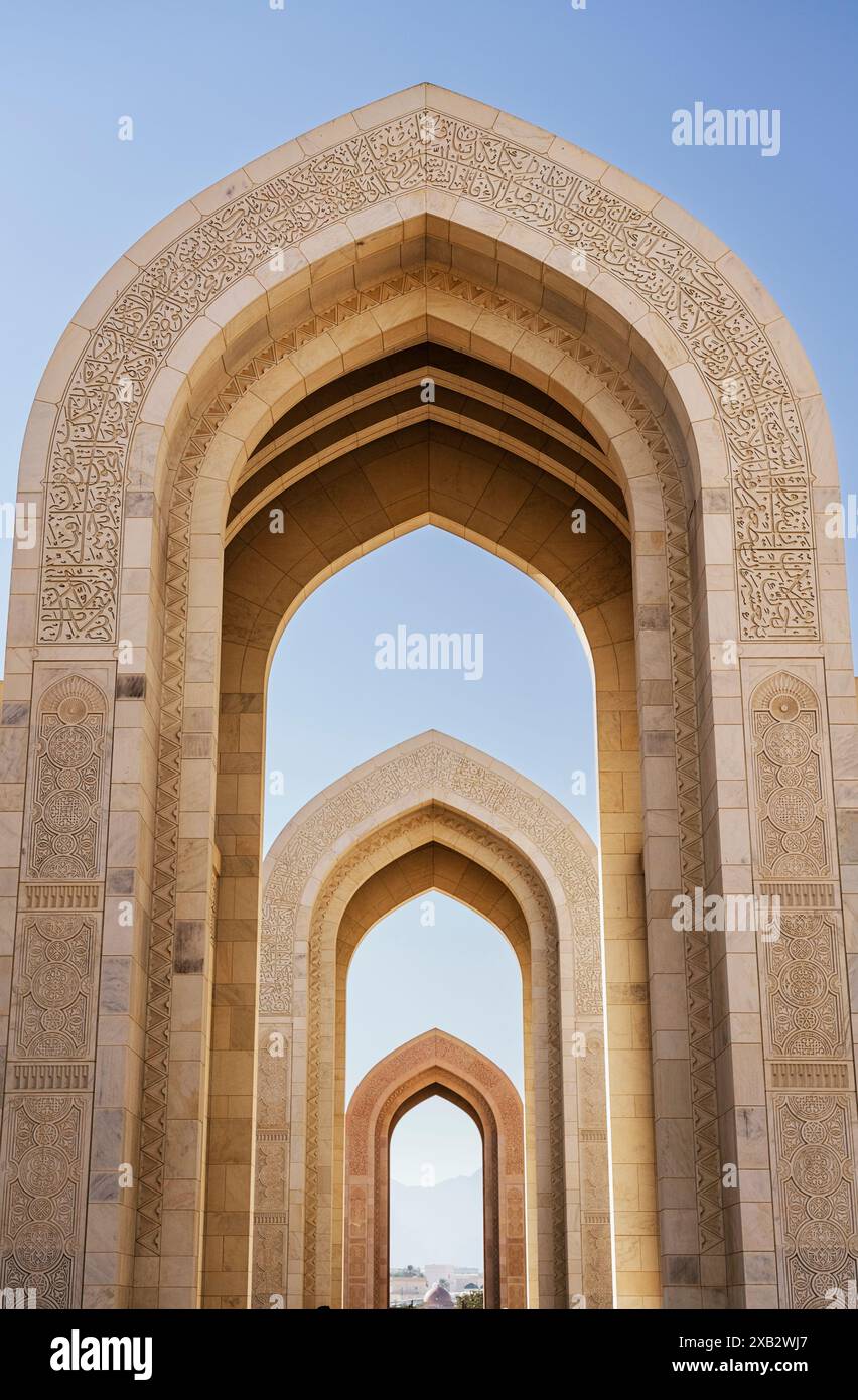 Architectural beauty of arched walkways with intricate carvings in Oman Stock Photo - Alamy