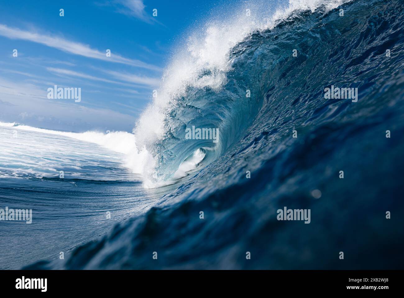 A powerful and pristine wave curls beautifully at Teahupoo, known for ...