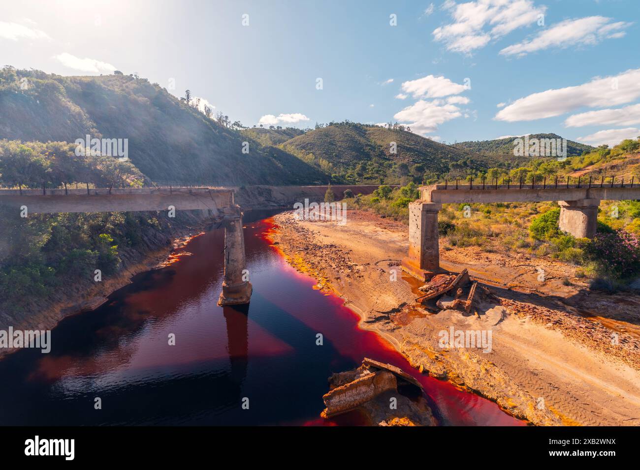 A stunning vista capturing the unique terrains and the reddish river ...