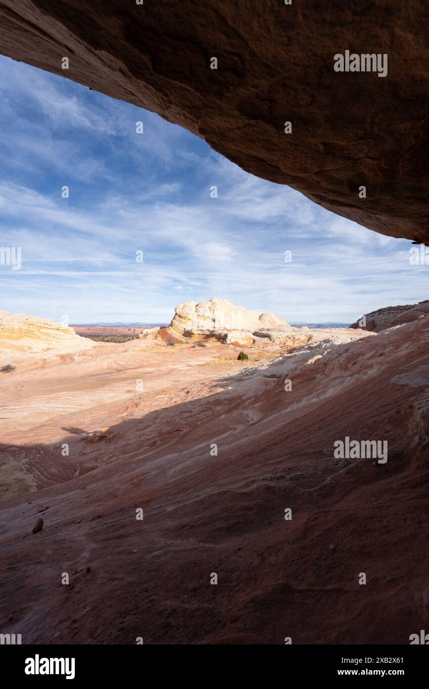 Vast Arizona desert landscape viewed from under a rocky overhang ...