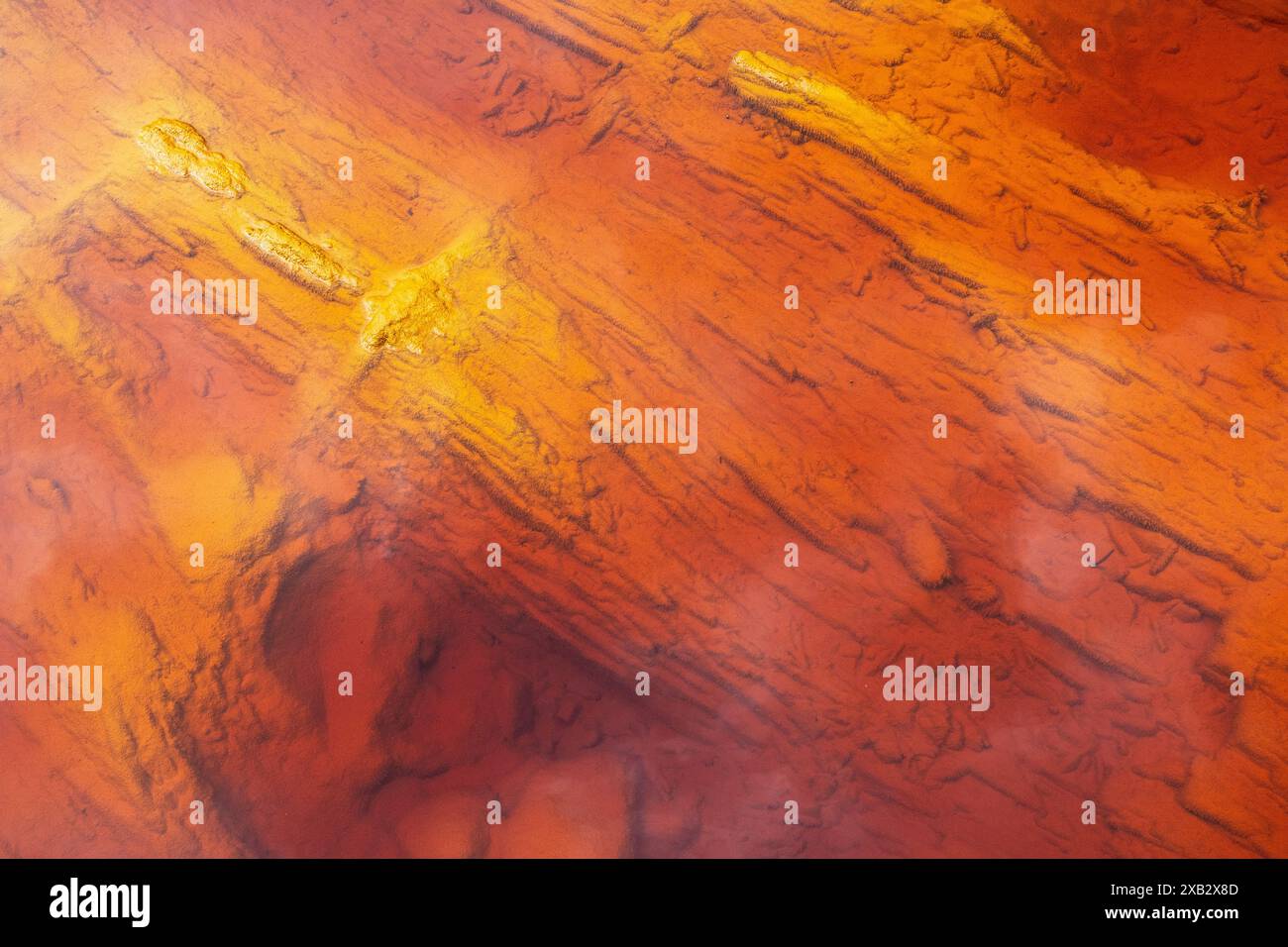 Aerial view of the vibrant orange and red Rio Tinto river, showcasing ...