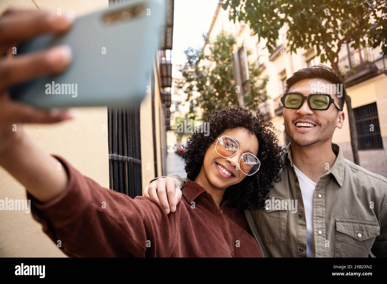 A multiethnic couple, composed of a Chinese man and a Hispanic woman ...
