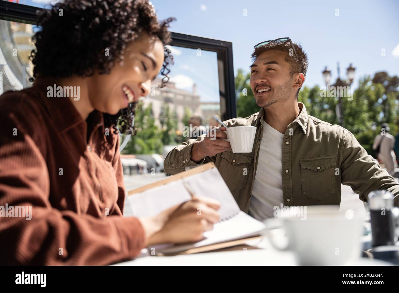 A multiethnic couple, composed of a Chinese man and a Hispanic woman ...