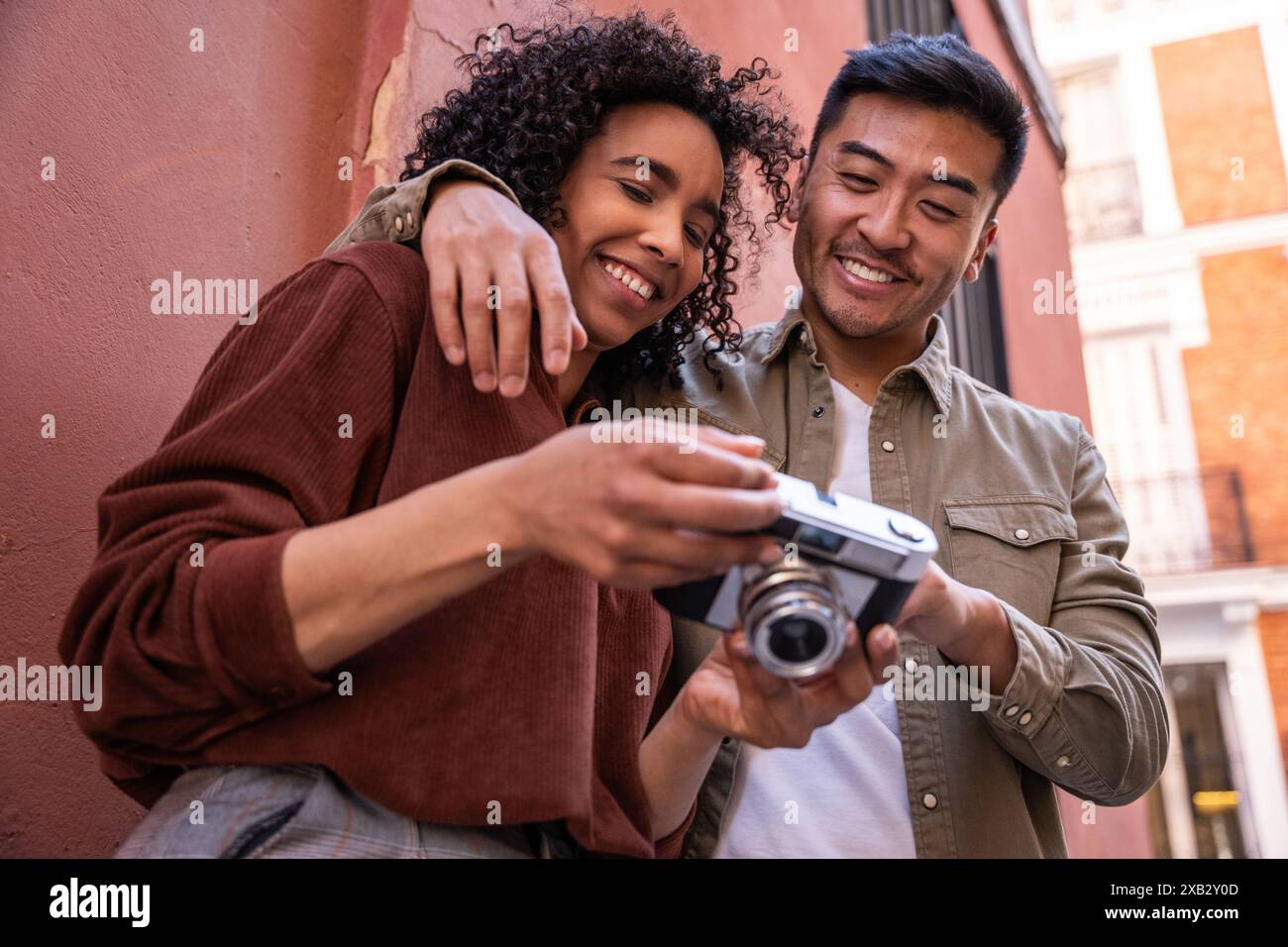 A multiethnic couple, featuring a Chinese man and a Hispanic woman ...