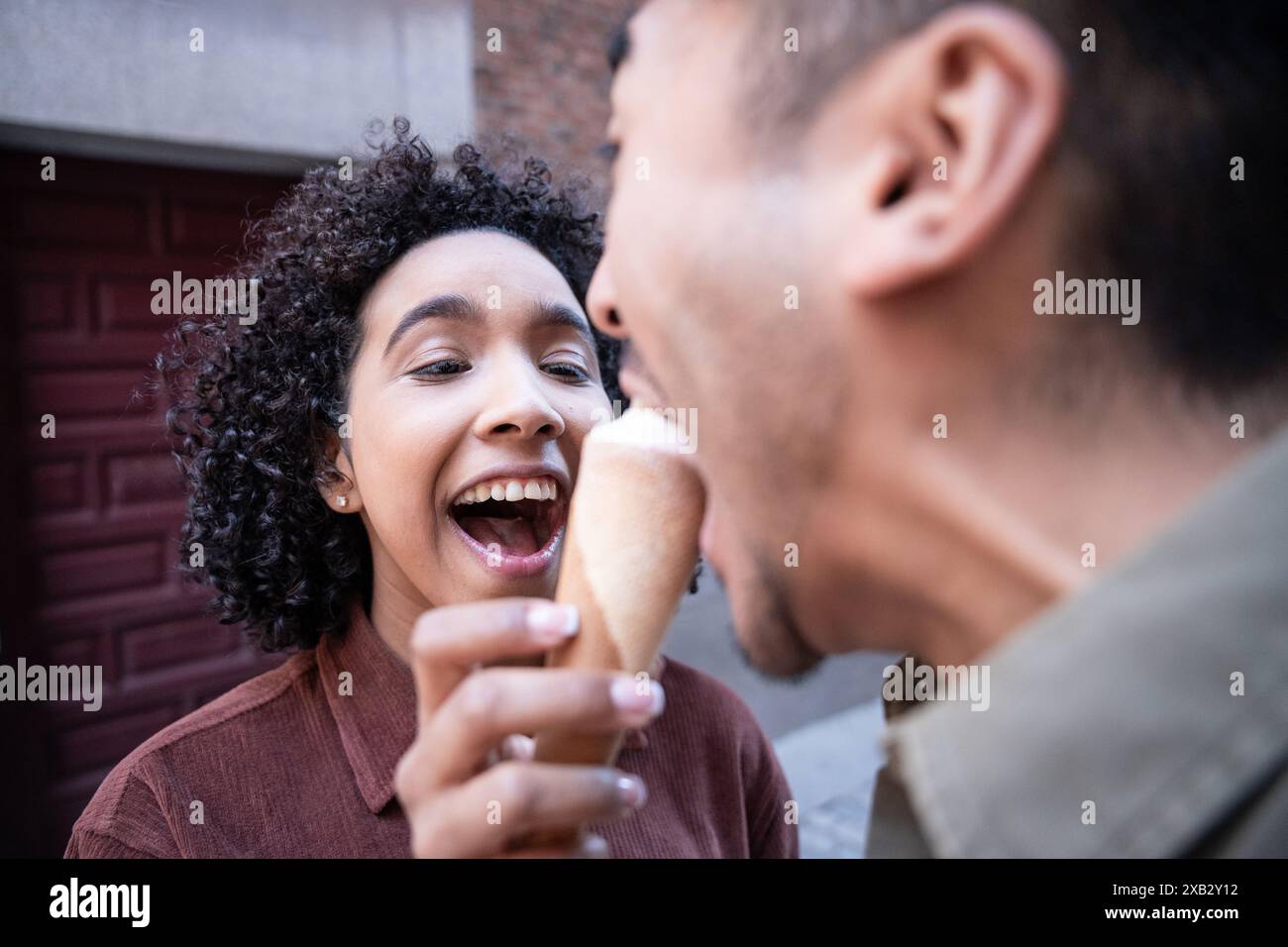 A multiethnic couple, composed of a Chinese man and a Hispanic woman ...