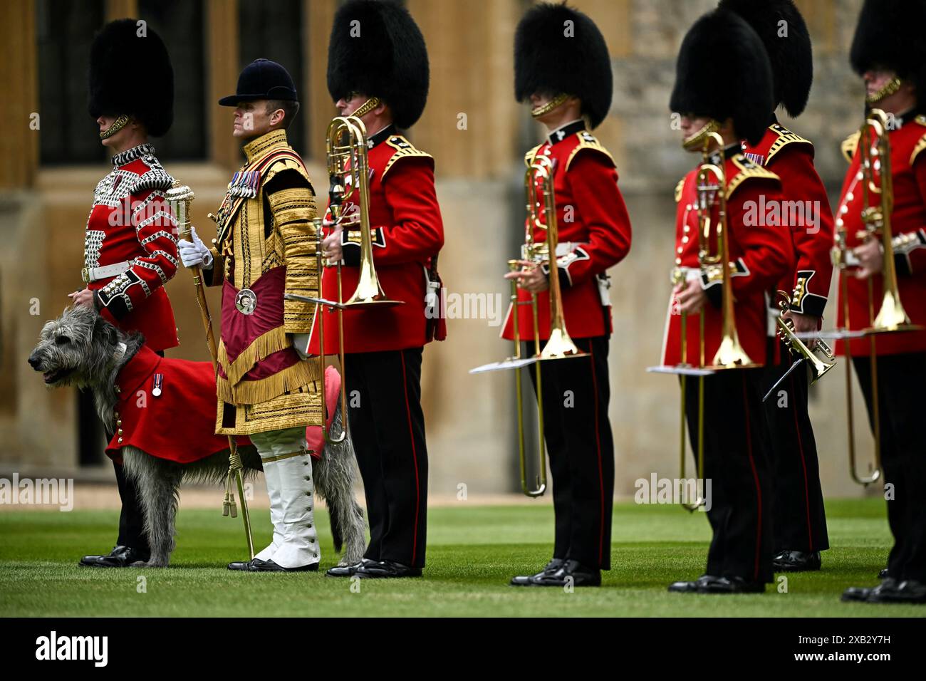 King Charles III, Colonel-in-Chief of the Household Division, presents ...