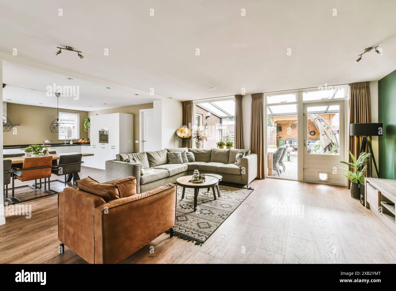 Elegant open space living room seamlessly blends modern style with ...